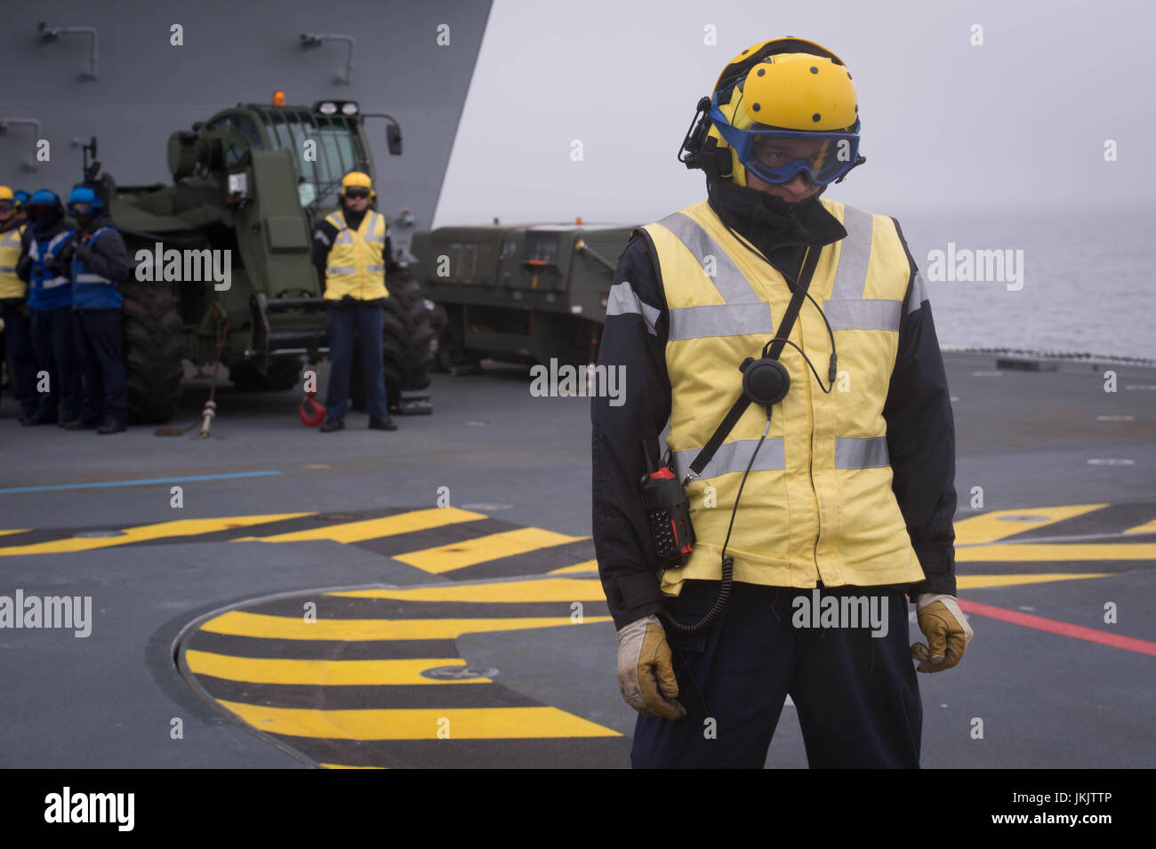 Crew on board HMS Queen Elizabeth, as the Royal Navy's new aircraft ...