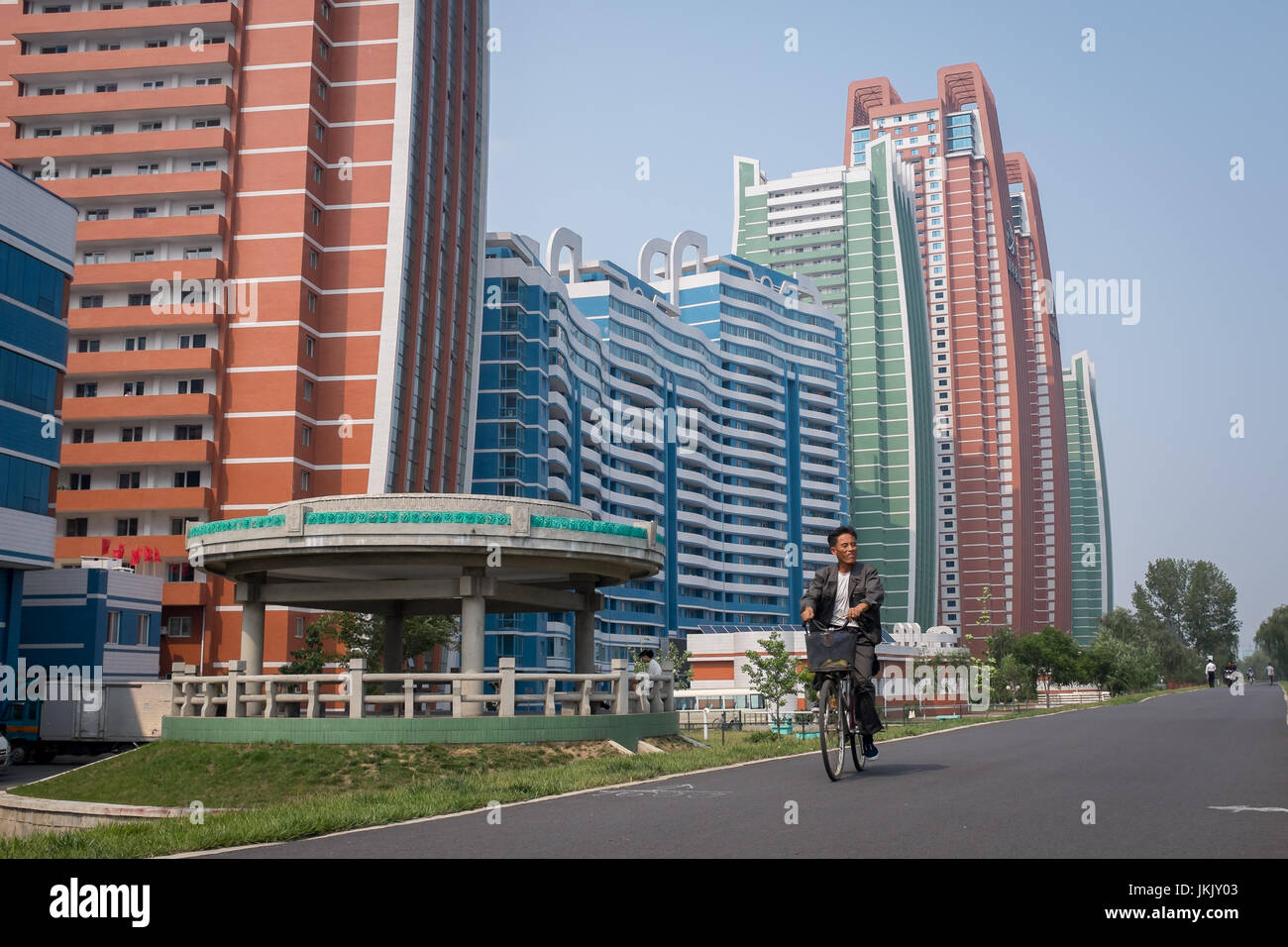 A cyclist on the newly built 'Scientist Street', built for the workers ...