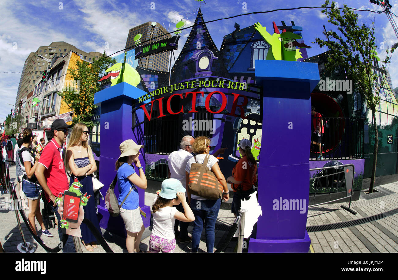 Montreal,Canada 23 July,2017.People waiting in-line to visit a funhouse ...