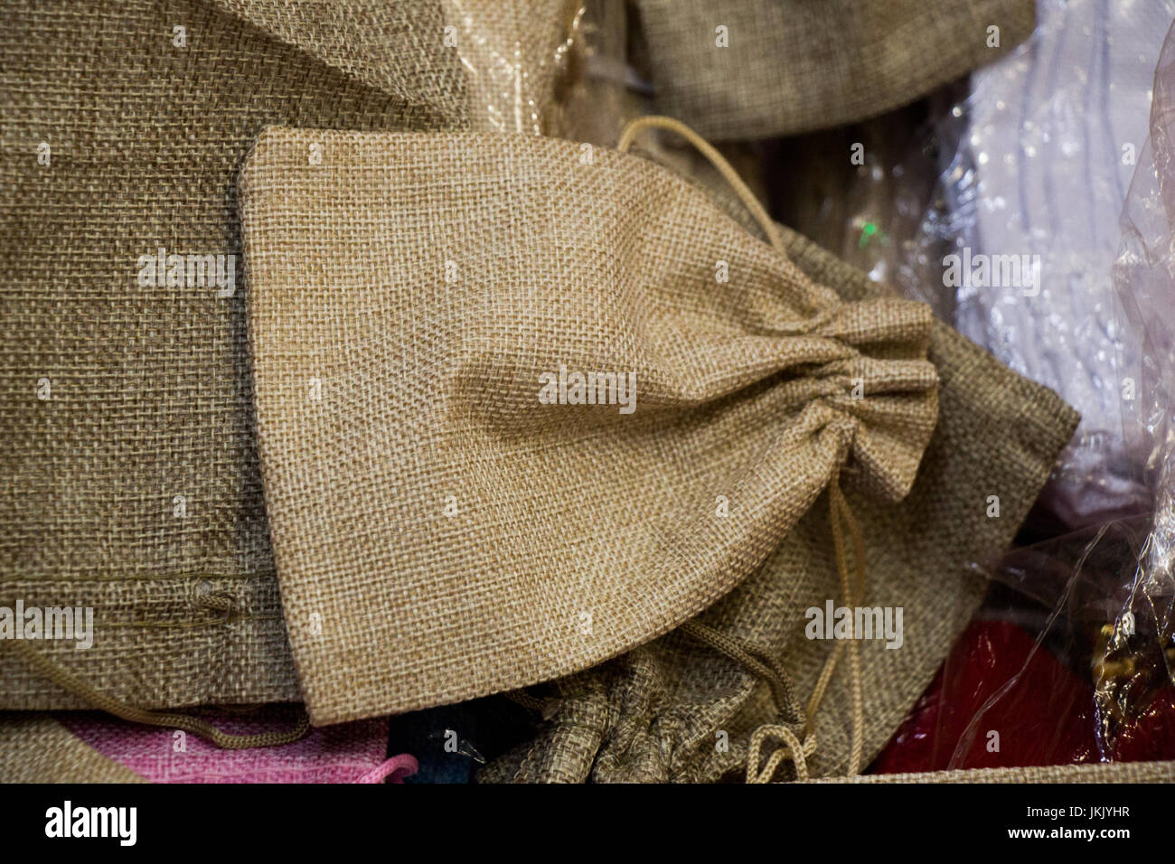 Empty little sack made of linen on canvas background Stock Photo - Alamy