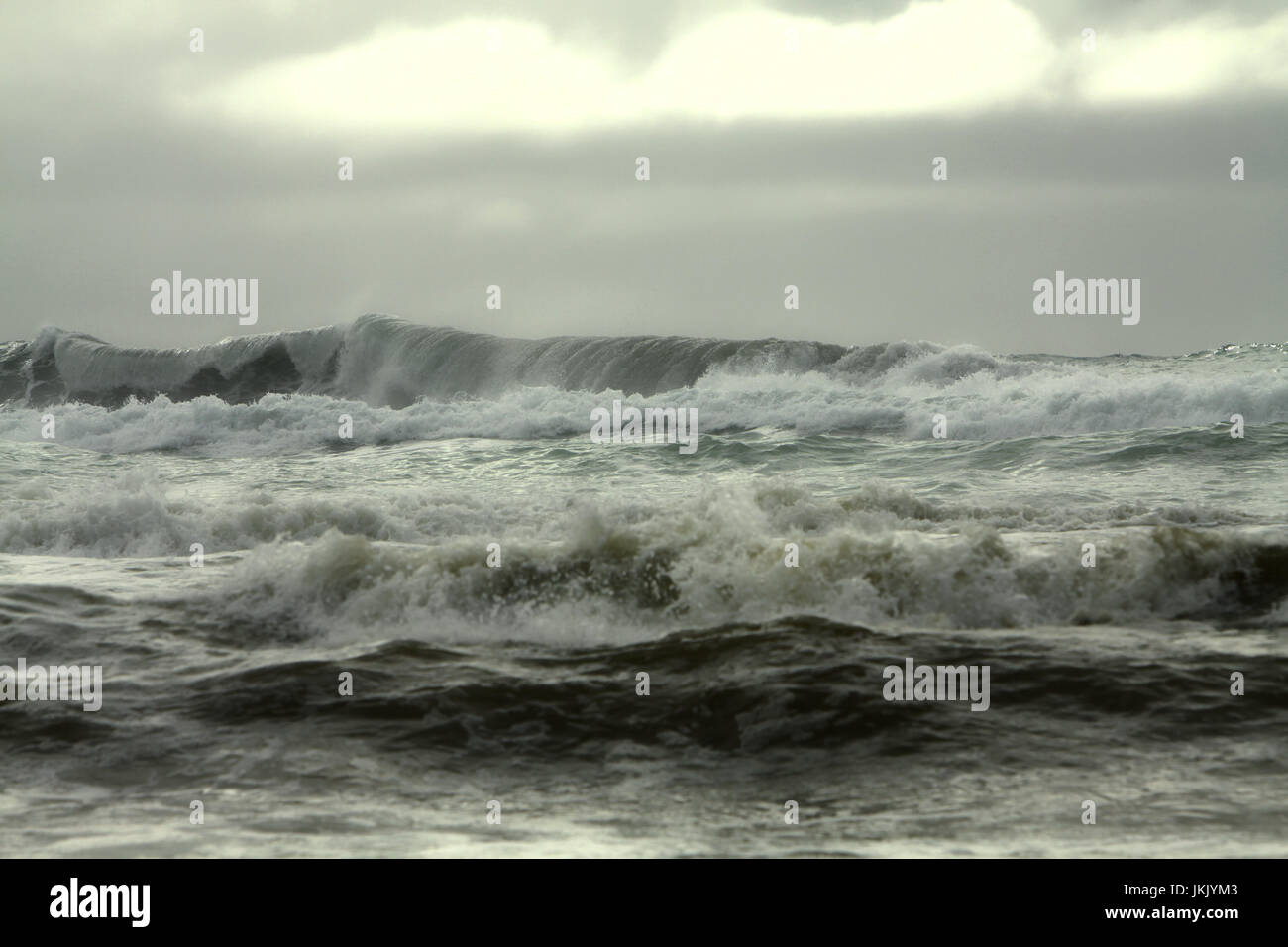 Breaking waves on a tempestuous afternoon Stock Photo - Alamy