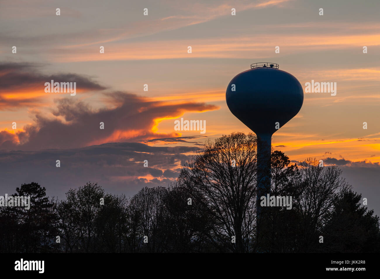 Water Tower Silhouetted in the Evening Sky Stock Photo - Alamy