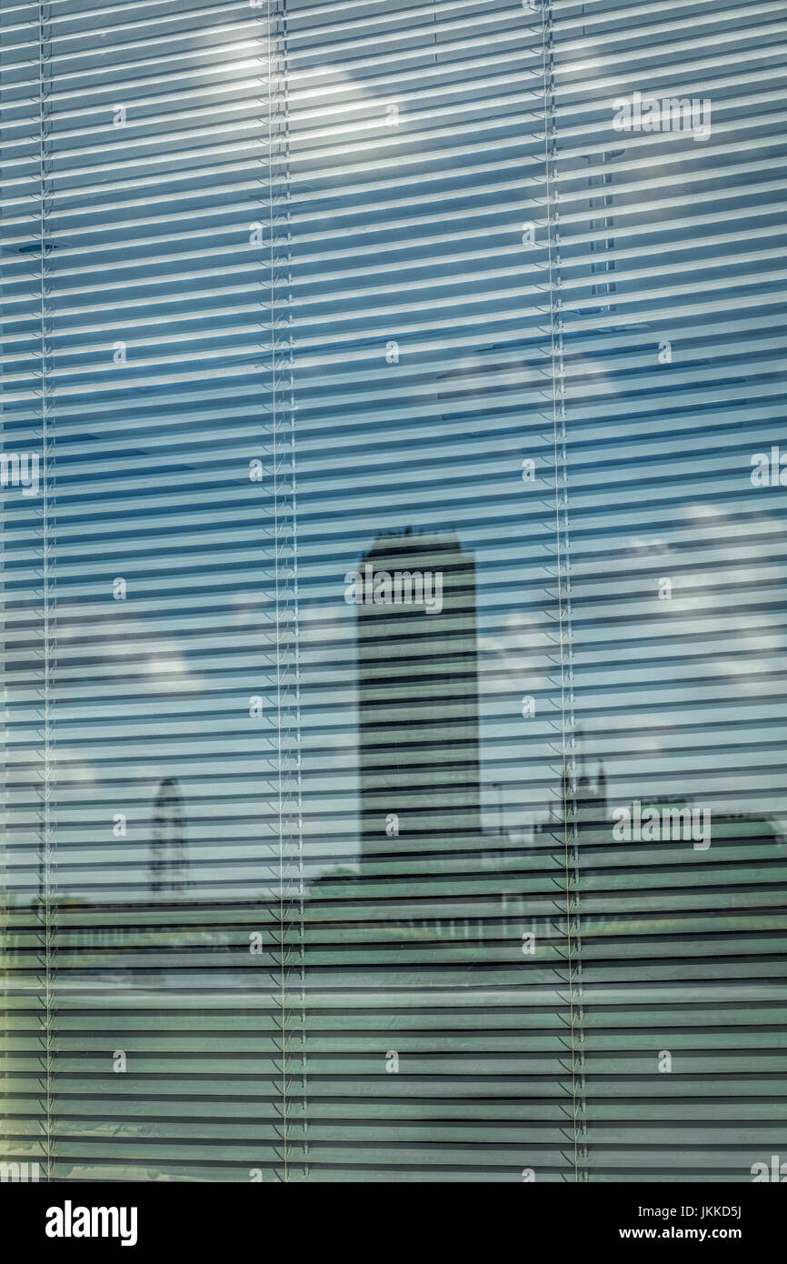Reflections of Parliament in window Stock Photo - Alamy