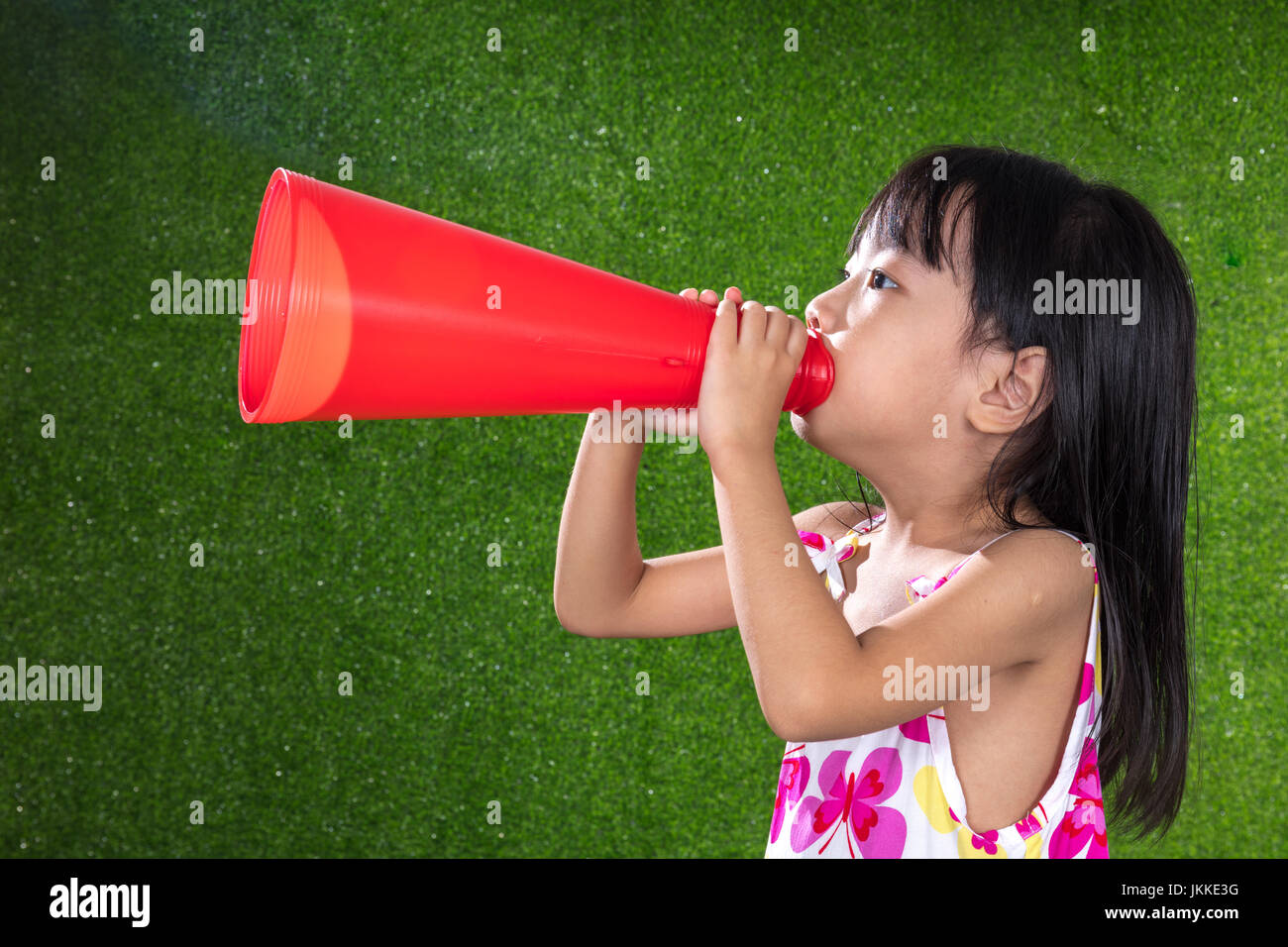 Kid shouting through megaphone hi-res stock photography and images - Alamy