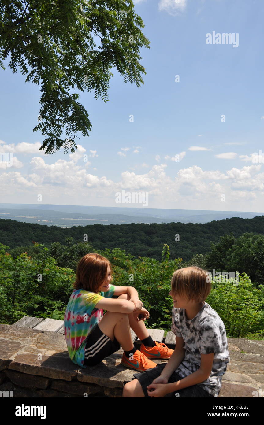 Boys talking hi-res stock photography and images - Alamy