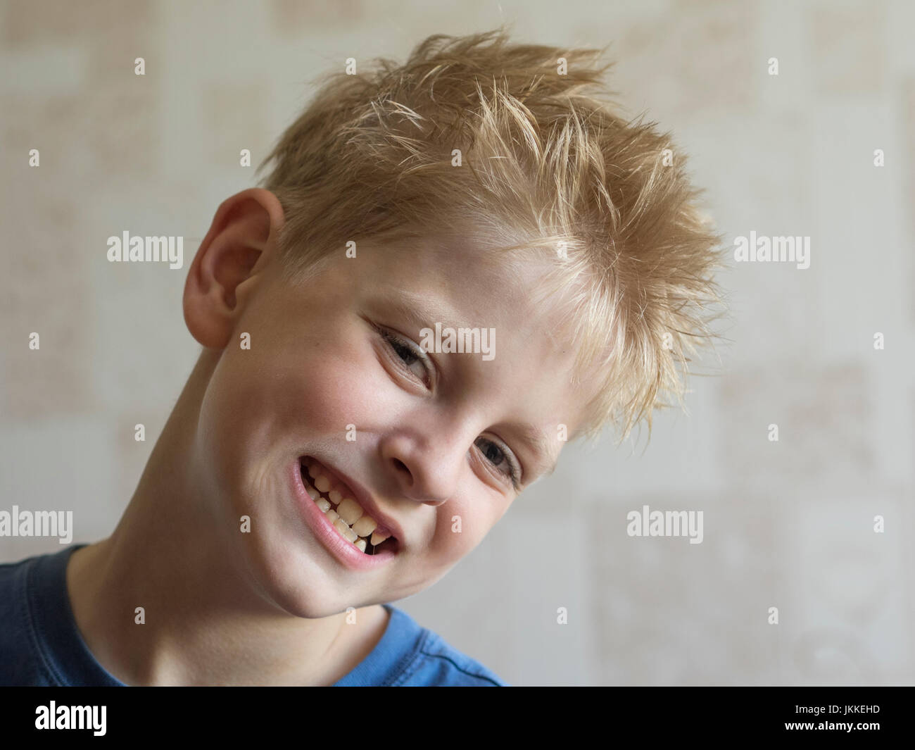Caucasian boy with disheveled hair Stock Photo - Alamy