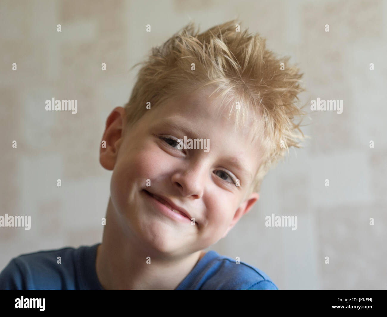 Disheveled boy hi-res stock photography and images - Alamy