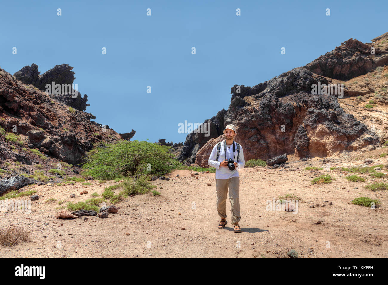 Iranian Island of Hormuz in Persian Gulf, mature man tourist with a ...