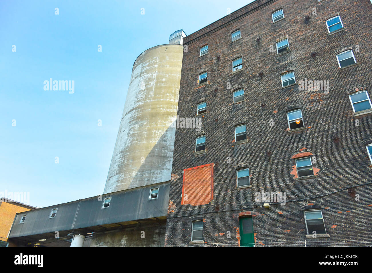 Facade view of brick wall and window of old sugar factory building in ...