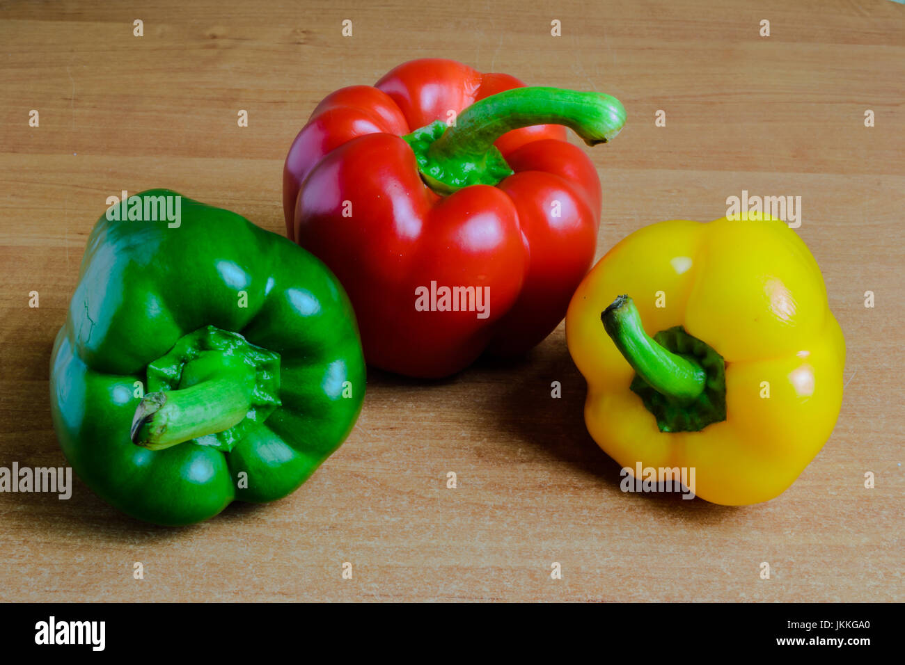 Three peppers on the table. Healthy food Stock Photo - Alamy