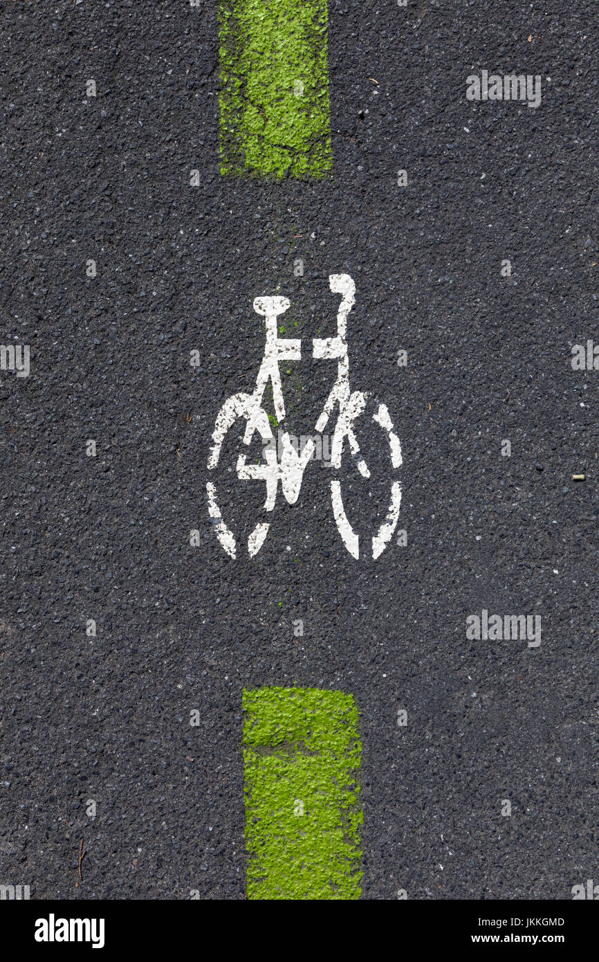 Bicycle symbol painted on the road to indicate a bicycle path Stock ...