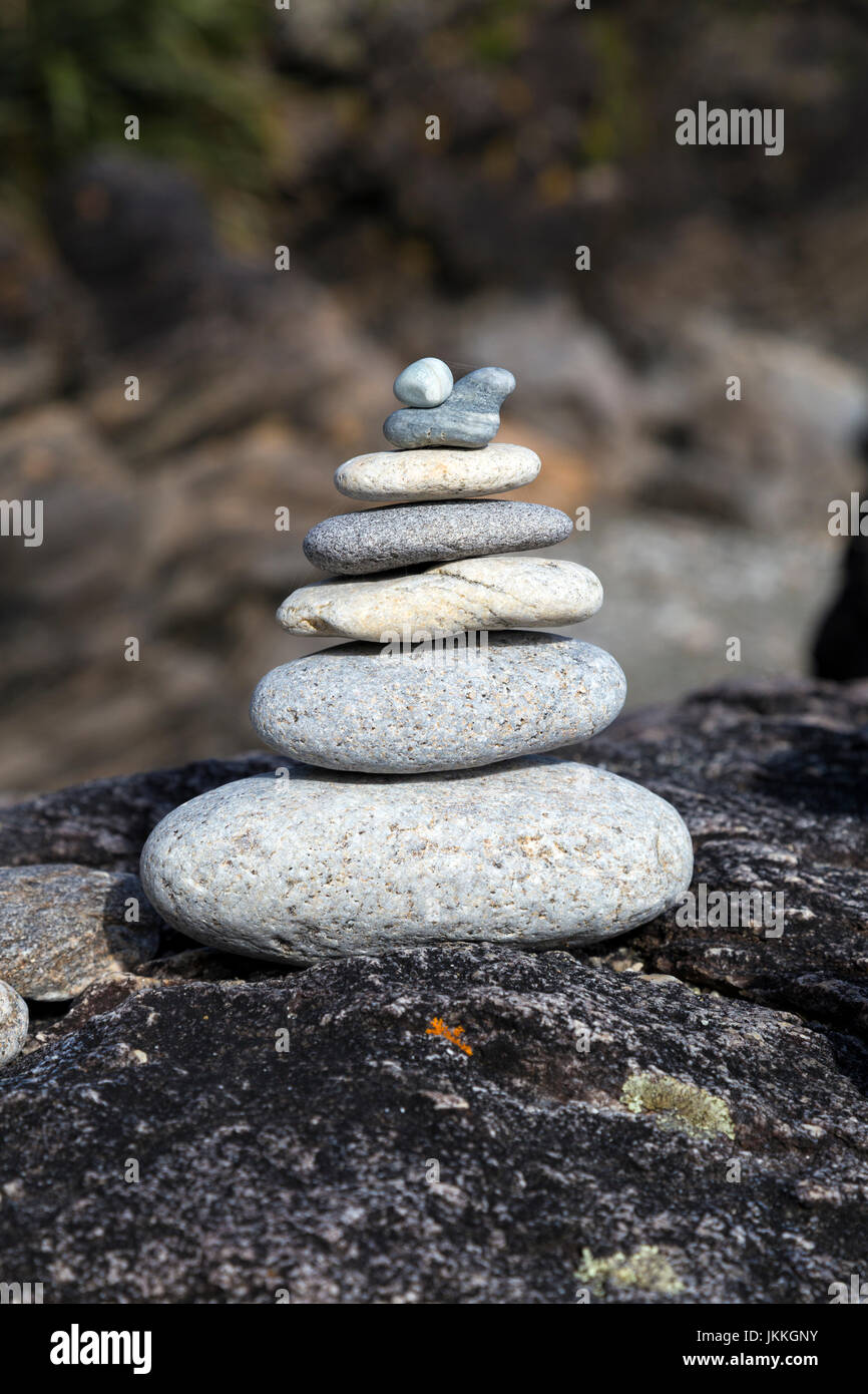 Smooth grey rocks balanced on each other Stock Photo - Alamy