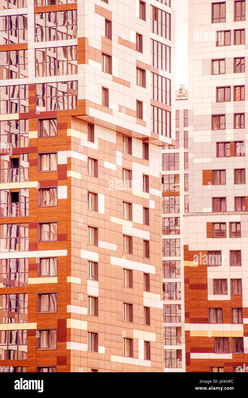 Modern residential building. Warm toned image Stock Photo - Alamy