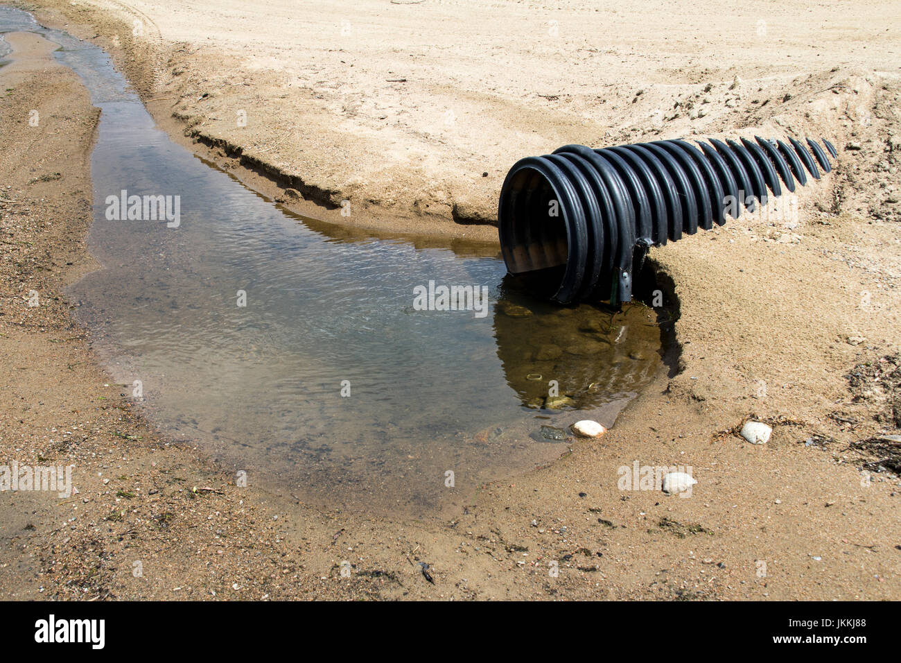 Sewer pipe on the beach hi-res stock photography and images - Alamy