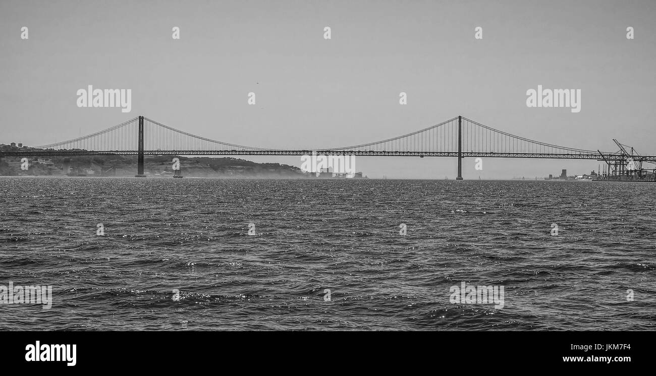 Famous 25th April Bridge over River Tajo in Lisbon aka Salazar Bridge ...