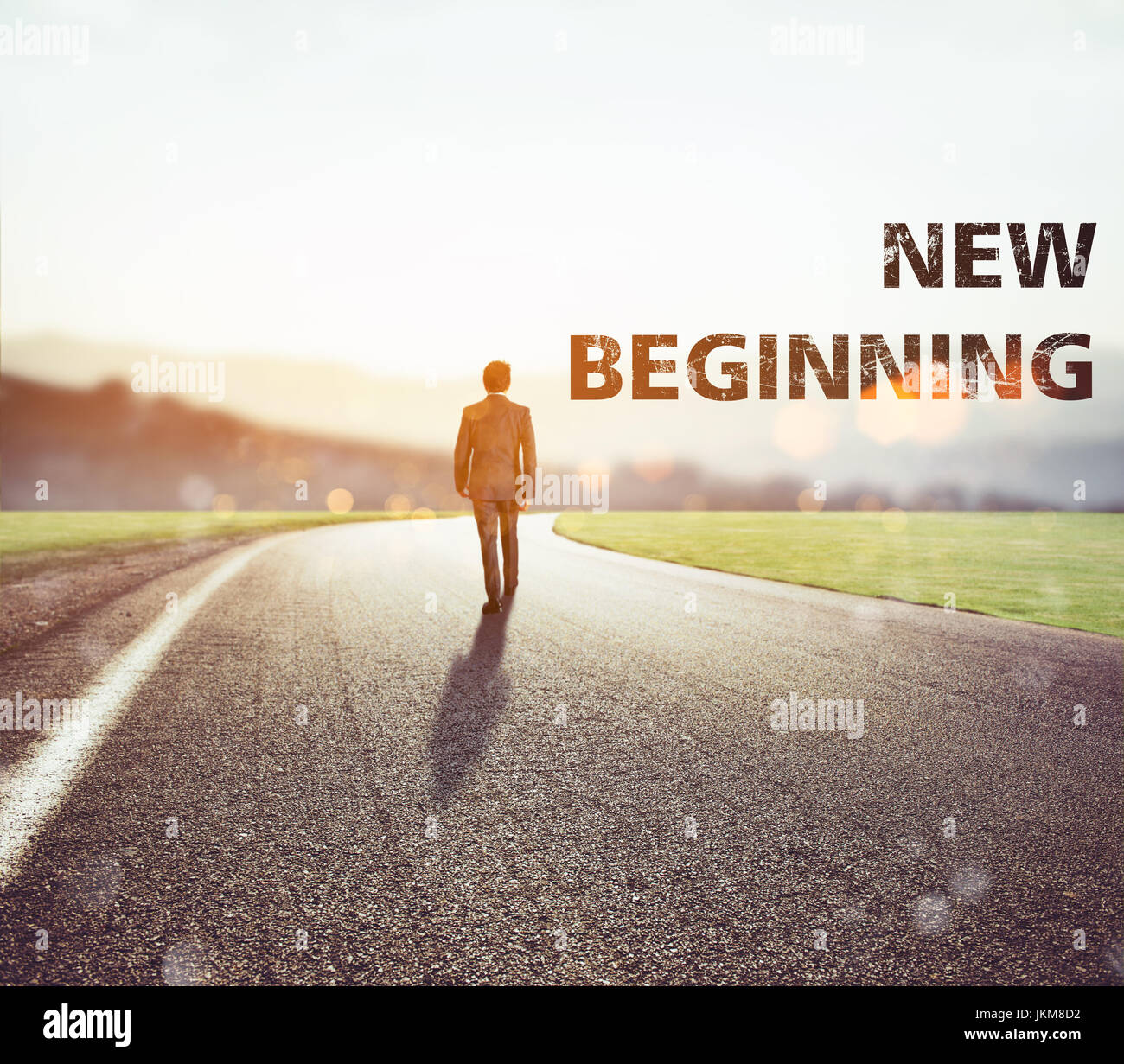 Man walks on an unknown road for a new adventure Stock Photo - Alamy