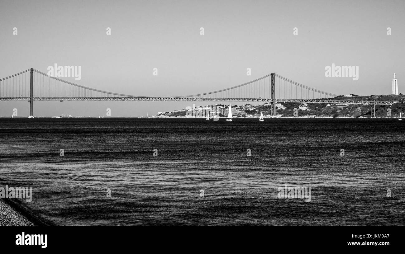 Famous 25th April Bridge over River Tajo in Lisbon aka Salazar Bridge ...