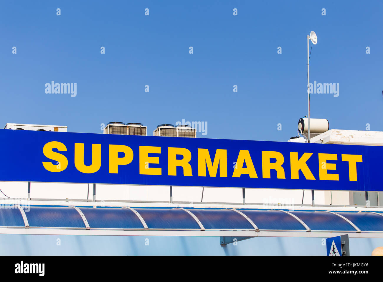 Supermarket sign on building Stock Photo - Alamy