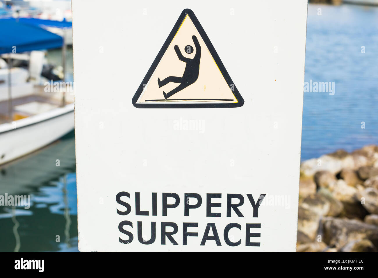 Warning: Slippery Surface sign Stock Photo - Alamy