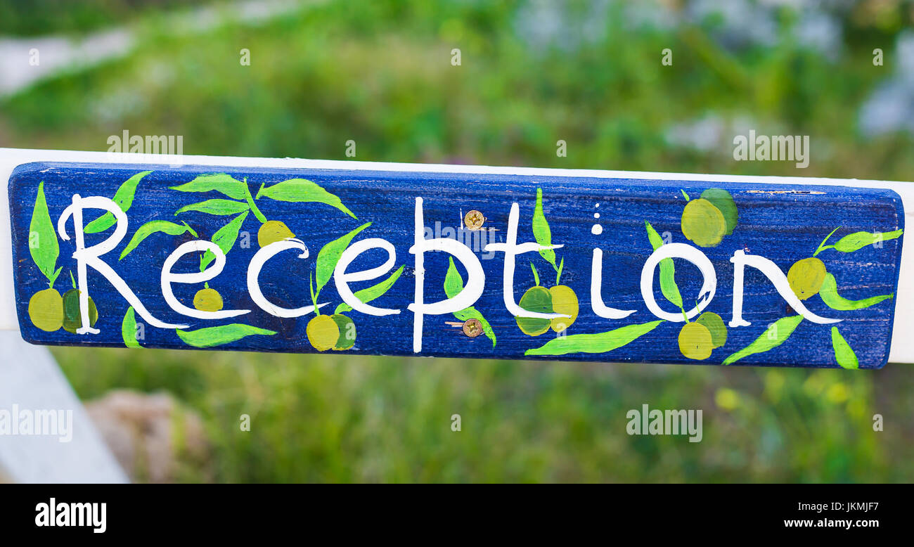 Reception sign at a hotel Stock Photo - Alamy