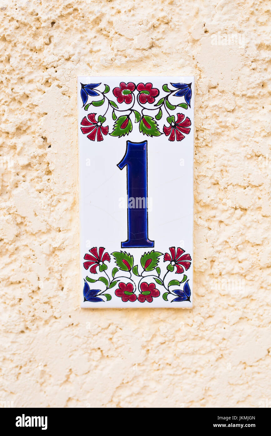 Door number 1 one conceptual image closeup Stock Photo - Alamy
