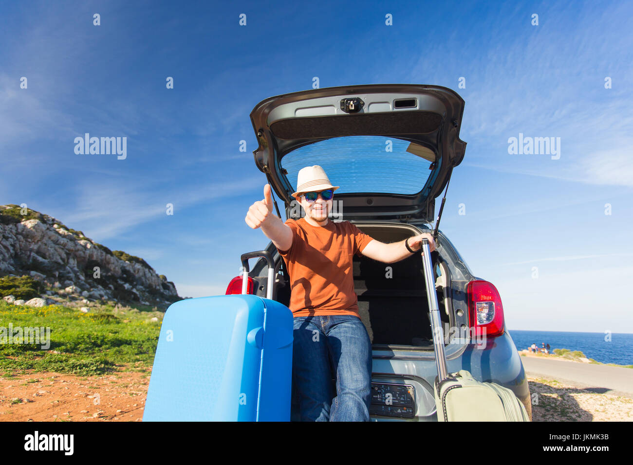 happy man enjoying road trip and summer vacation. Travel, holidays and ...