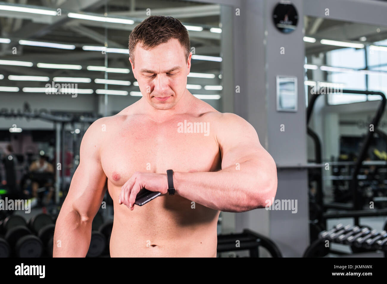 Man with smart device and use of mobile phone Stock Photo - Alamy