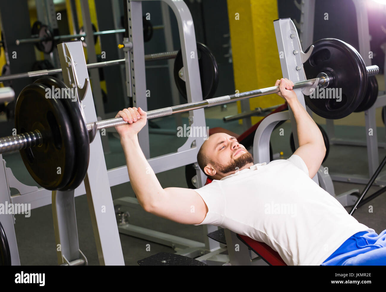 Strong man running exercise for the chest in the gym. Sport ...