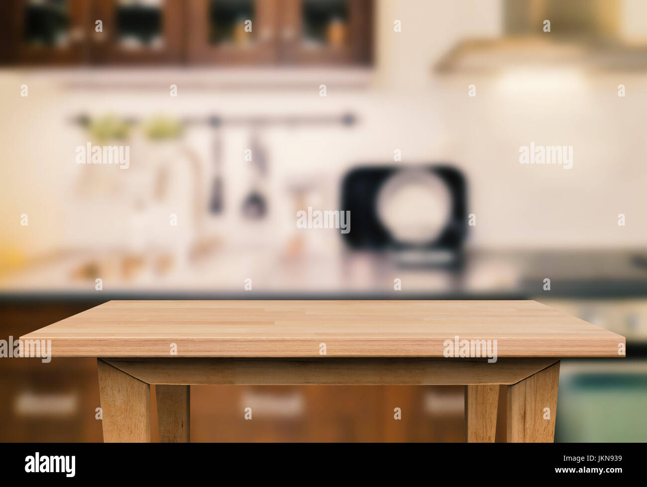 empty wooden table on kitchen background Stock Photo - Alamy