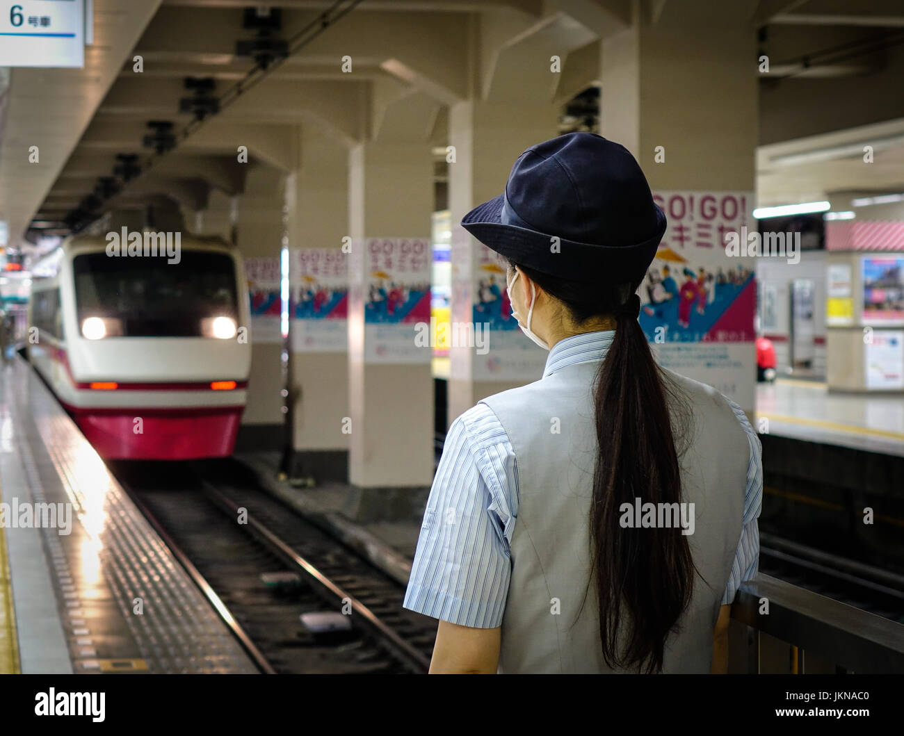 Young japanese woman railway track hi-res stock photography and images ...