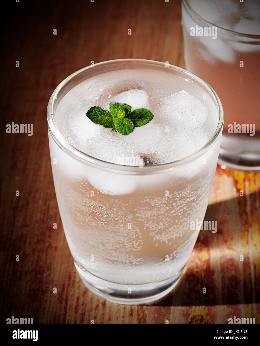 Cold water wiyh ice Stock Photo - Alamy