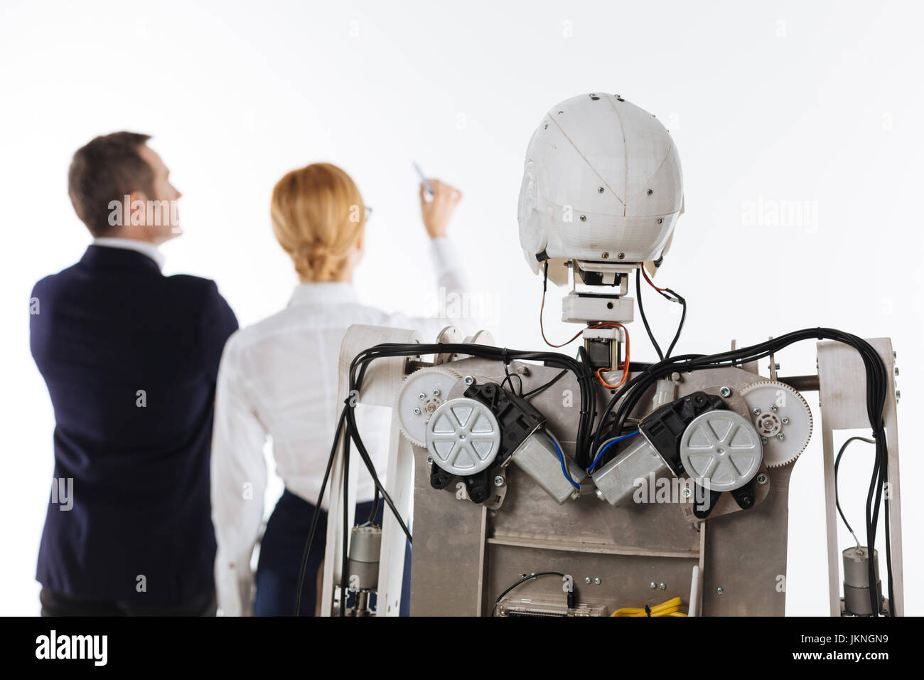 Creative enthusiastic scientists making calculations Stock Photo - Alamy
