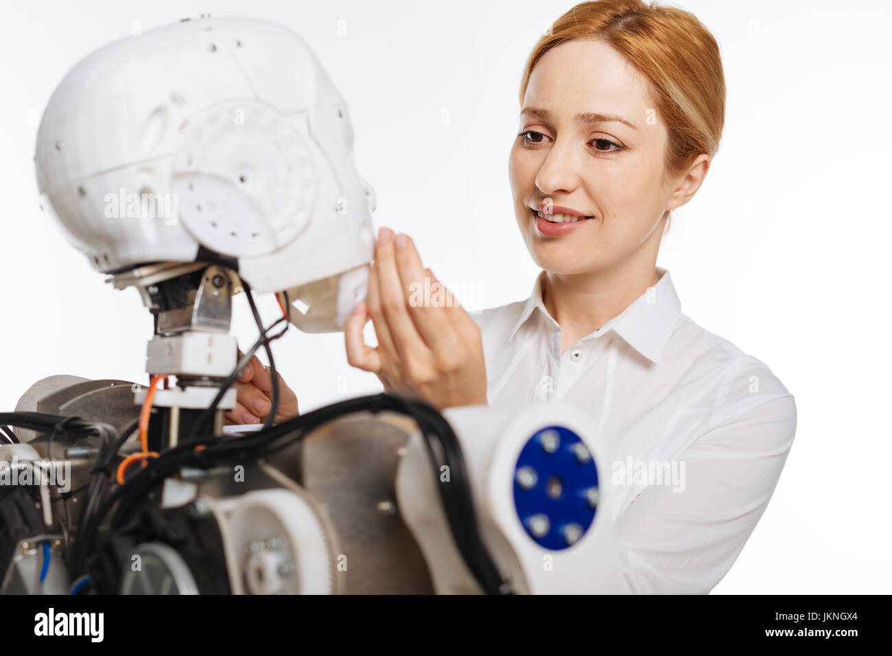 Robots touching hi-res stock photography and images - Alamy