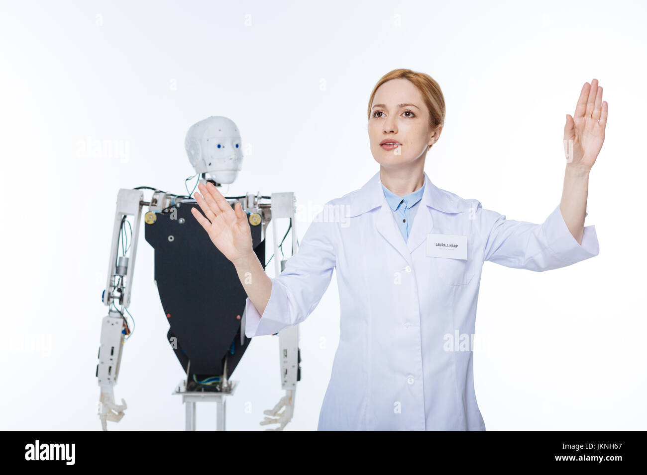 Ambitious capable woman looking on interactive computer screen Stock ...