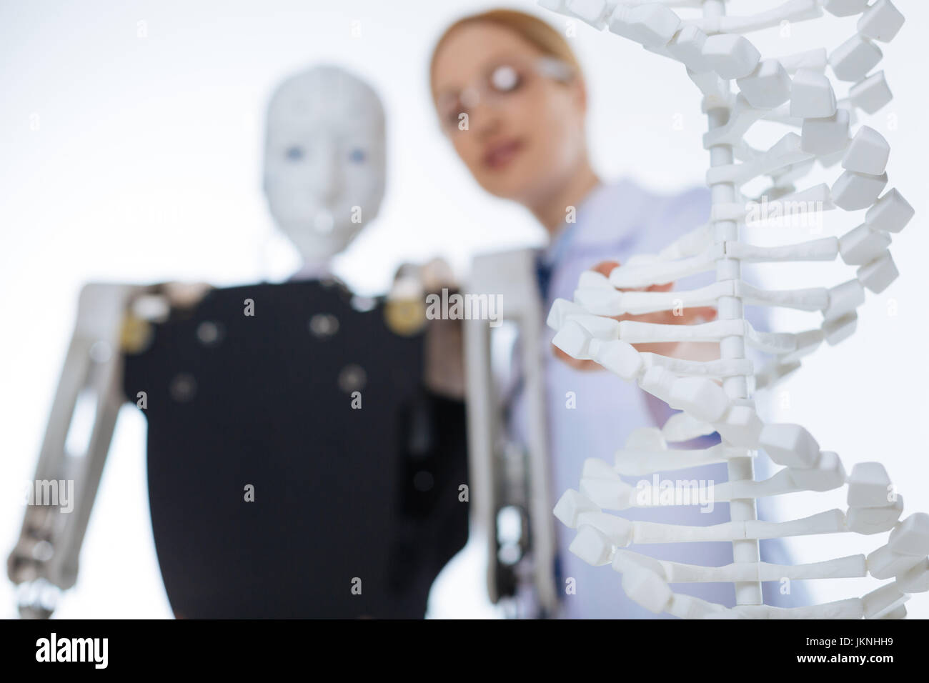 Confident creative scientist looking on the matter from another ...