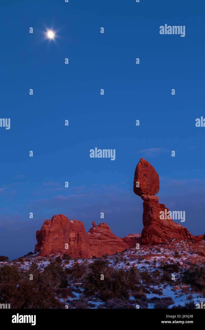 moon rise over the Balanced Rock in Arches National Park, Utah, USA ...