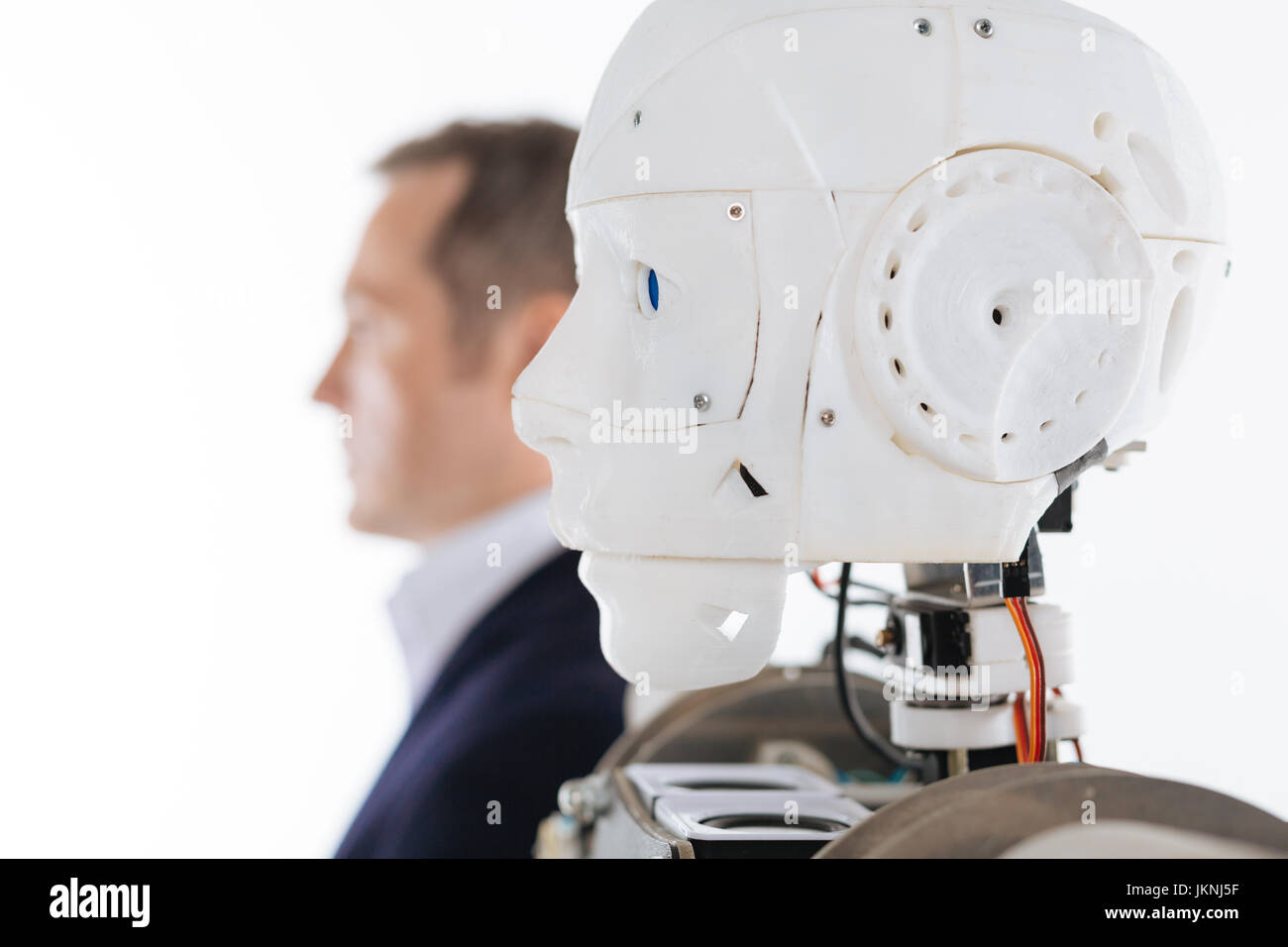 Profile picture of a robot and its prototype Stock Photo - Alamy