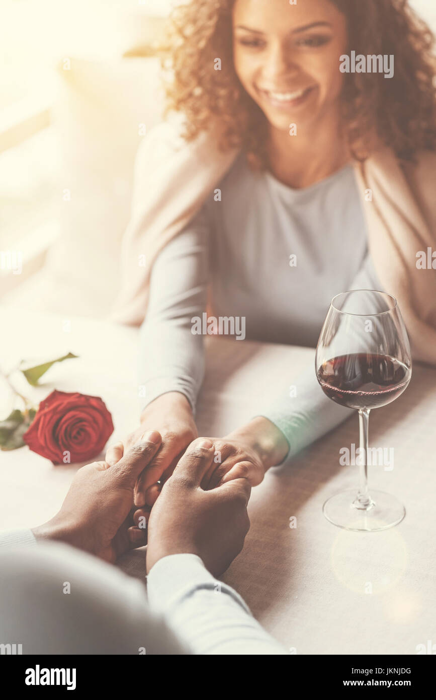 Happy delighted couple having a date Stock Photo - Alamy