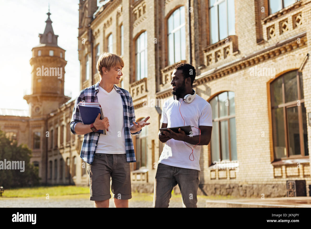 Inspired energetic students talking about future Stock Photo - Alamy