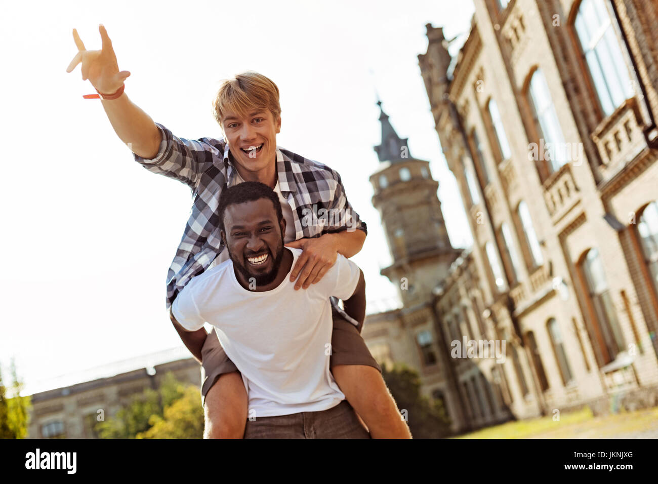 Genuine goofy guy having fun with his friend Stock Photo - Alamy
