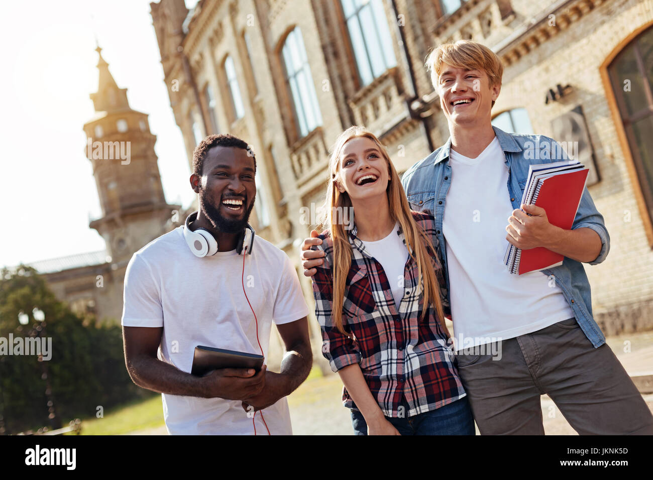 Adventurous motivated students looking happy Stock Photo - Alamy