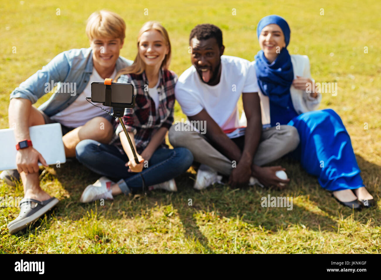 Amazing open minded students making new friends Stock Photo - Alamy