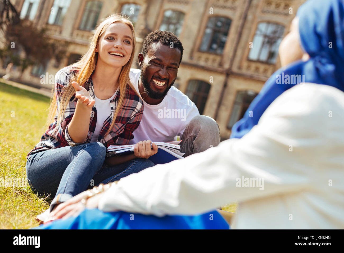 Telling a joke hi-res stock photography and images - Alamy