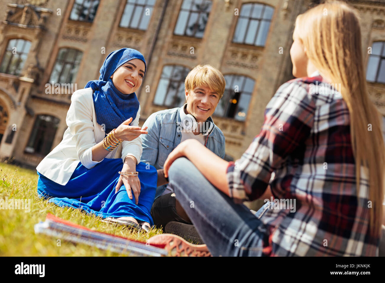 Classy pretty woman telling interesting stories Stock Photo - Alamy