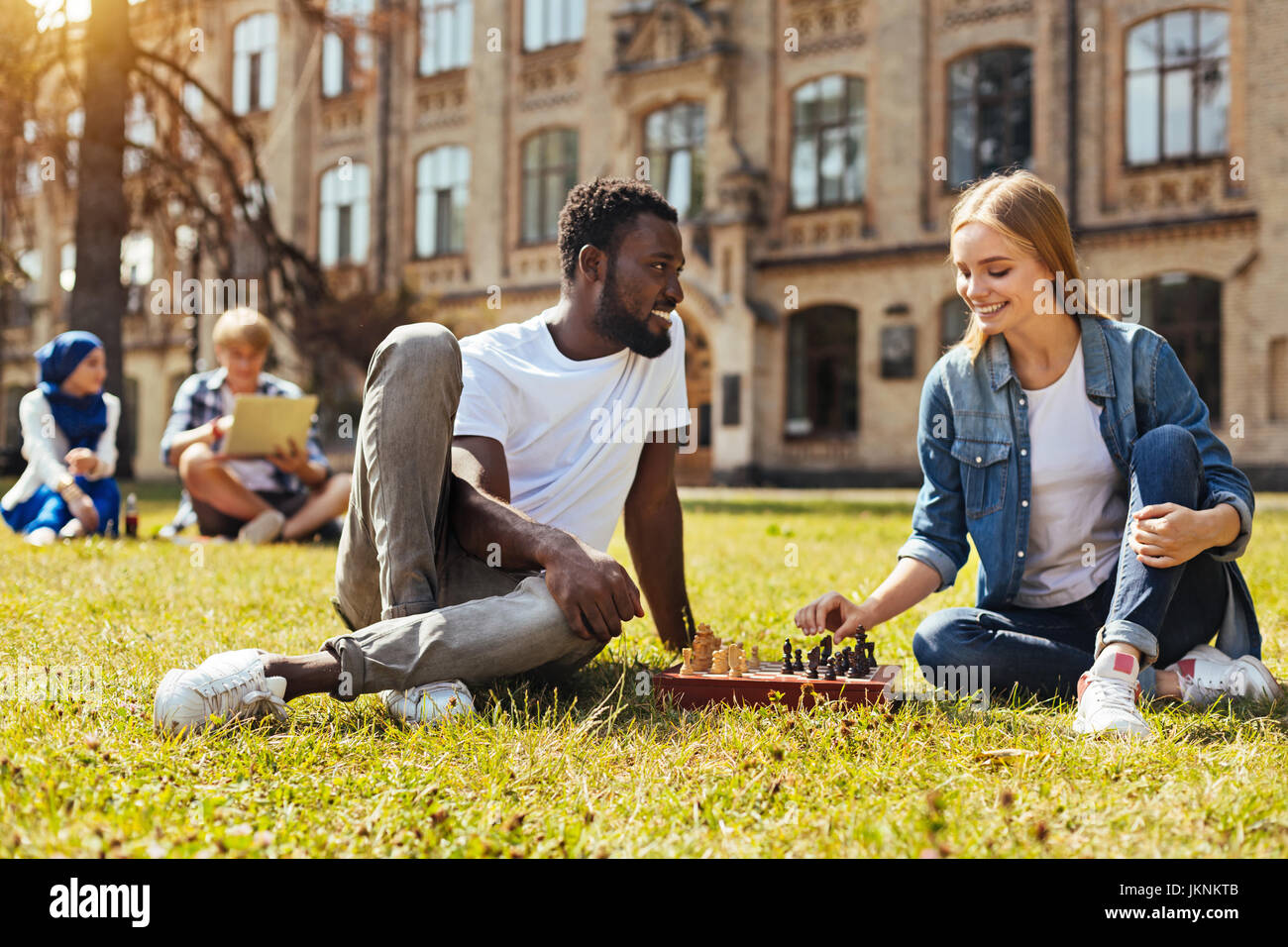 Wonderful brilliant friends playing chess Stock Photo - Alamy