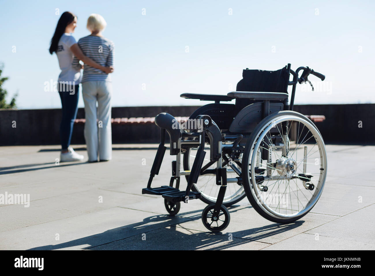 Old lady taking a walk hi-res stock photography and images - Alamy