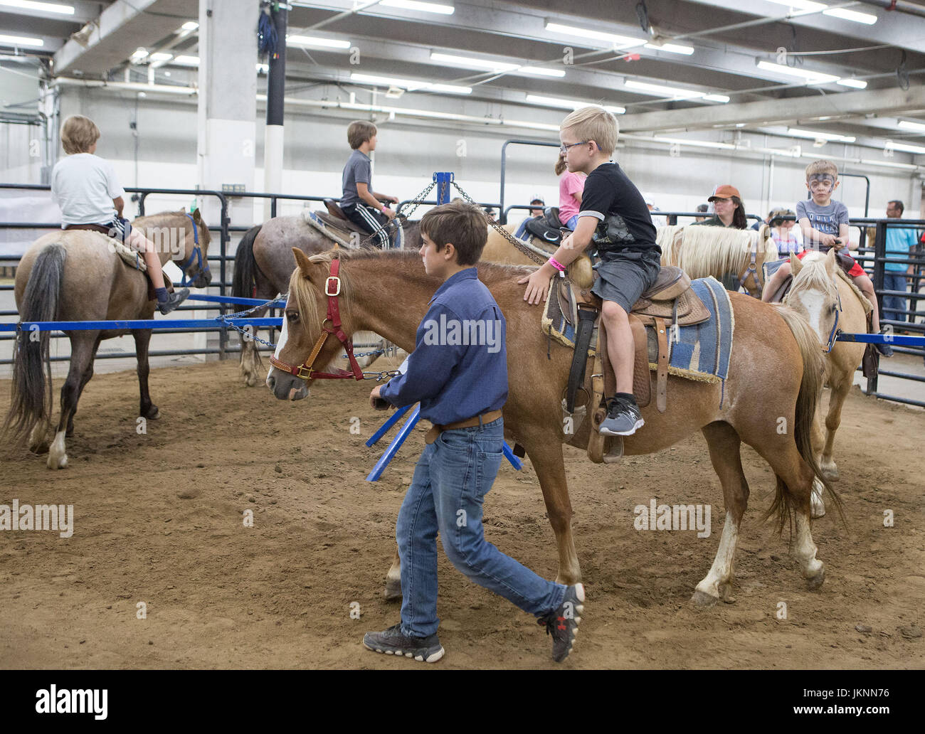 Denver, Colorado, USA. 22nd July, 2017. Children ride horses during the ...