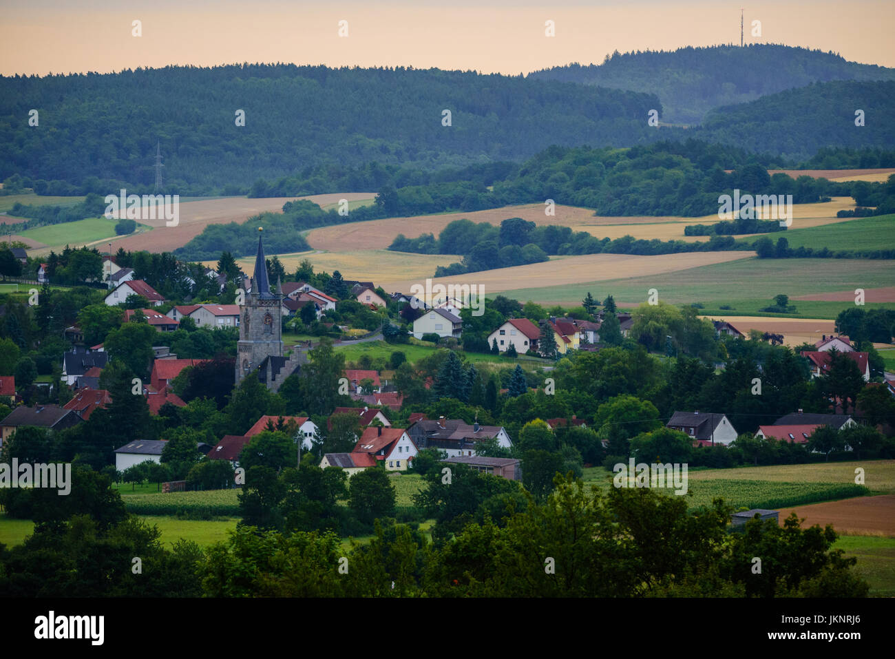 The sun rises over Urspringen, Germany, 24 July 2017. The Rhoen and the ...
