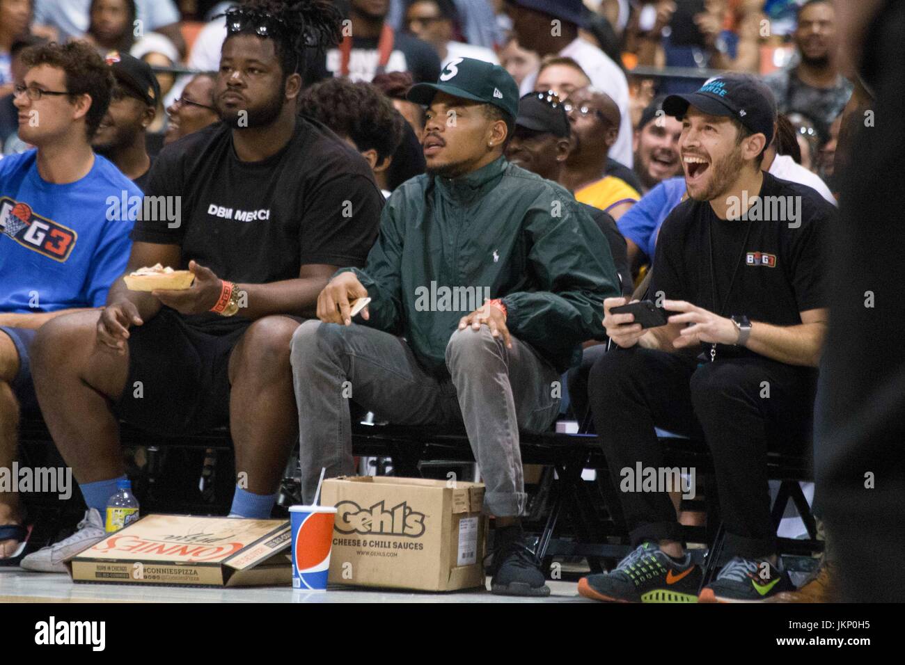 Chance Rapper gets into game sitting courtside watching game Big3 Week ...