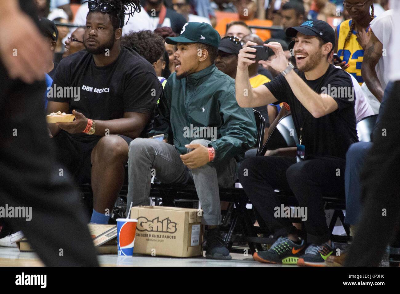 Chance Rapper gets into game sitting courtside watching game Big3 Week ...